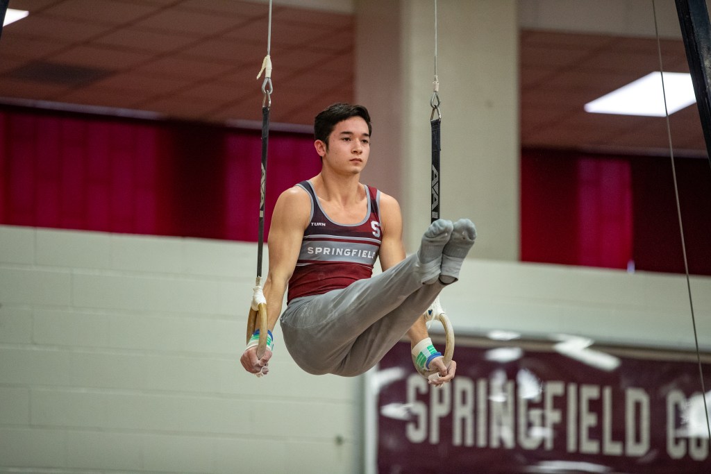 Christian Wilkey Jr. joins the men's gymnastics coaching staff